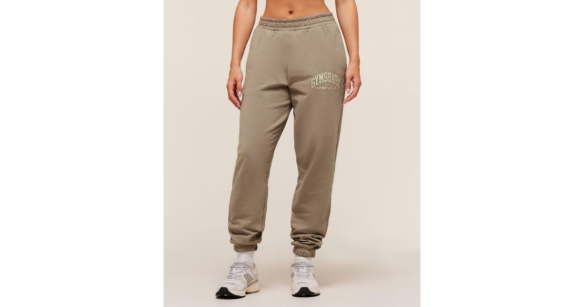 GYMSHARK Collegiate Graphic Joggers in Natural | Lyst UK