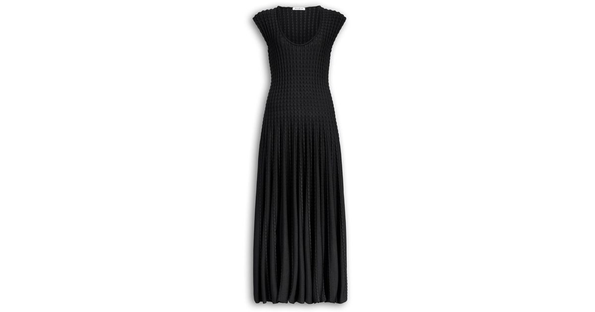 Alaïa Knitted Flare Dress in Black | Lyst