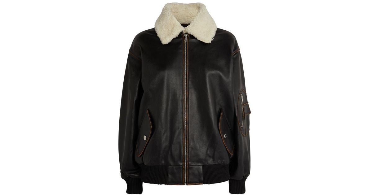 Sandro Leather Shearling Bomber Jacket in Black | Lyst UK