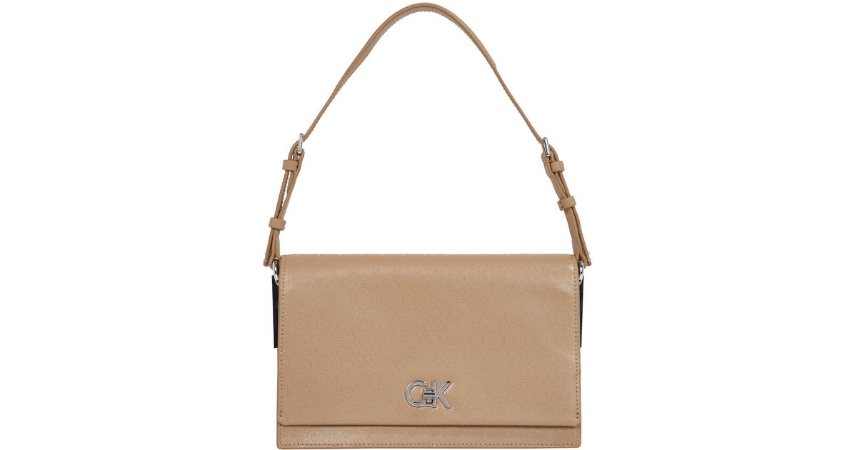 Calvin Klein Ck Elongated Shoulder Bags in Natural | Lyst UK