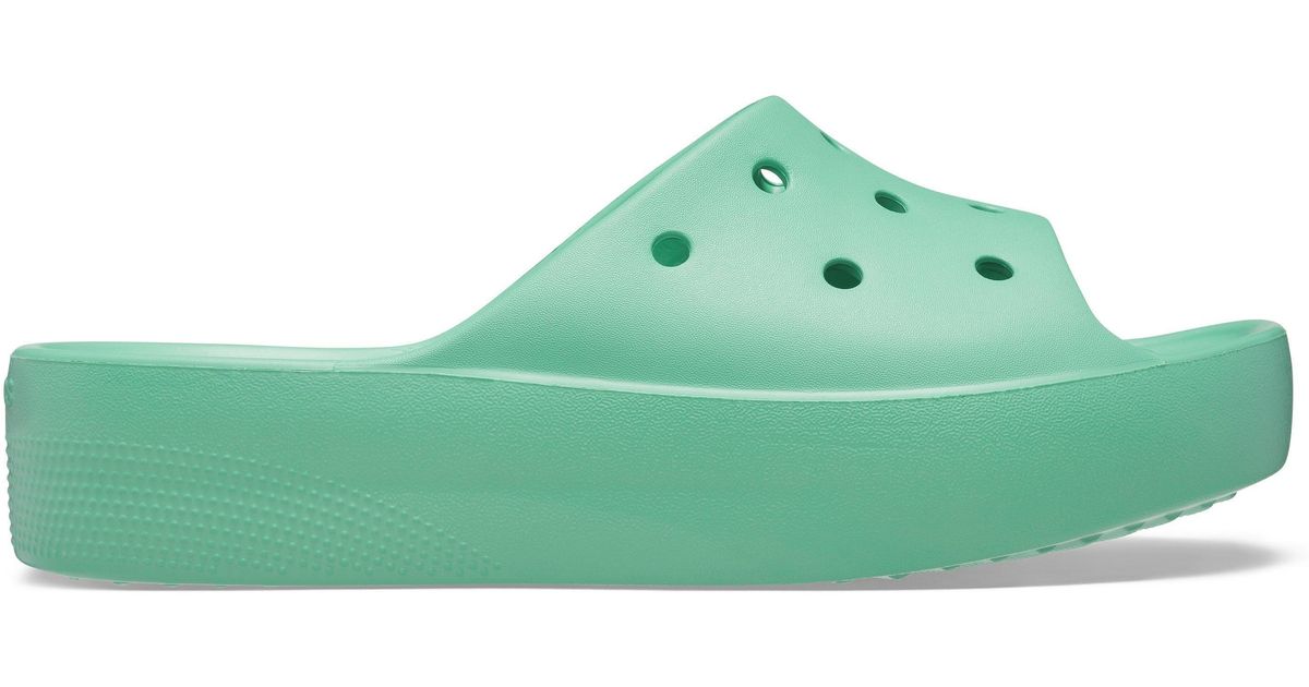 Crocs™ Classic Sliders in Green | Lyst UK