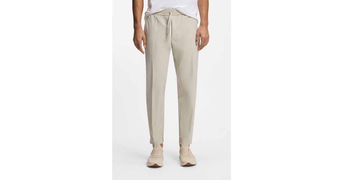 BOSS Tapered-Fit Trousers in Natural for Men | Lyst UK