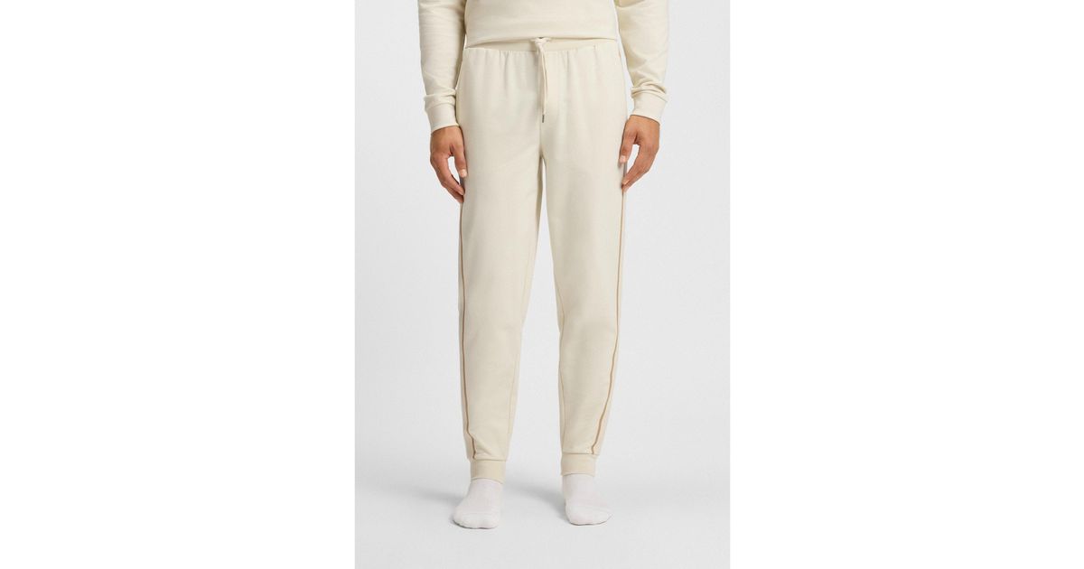 BOSS Cotton-Terry Tracksuit Bottoms With Tape And Logo in Natural for ...