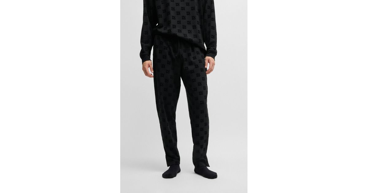 HUGO Straight-leg Tracksuit Bottoms With Flock-print Stacked Logos in ...