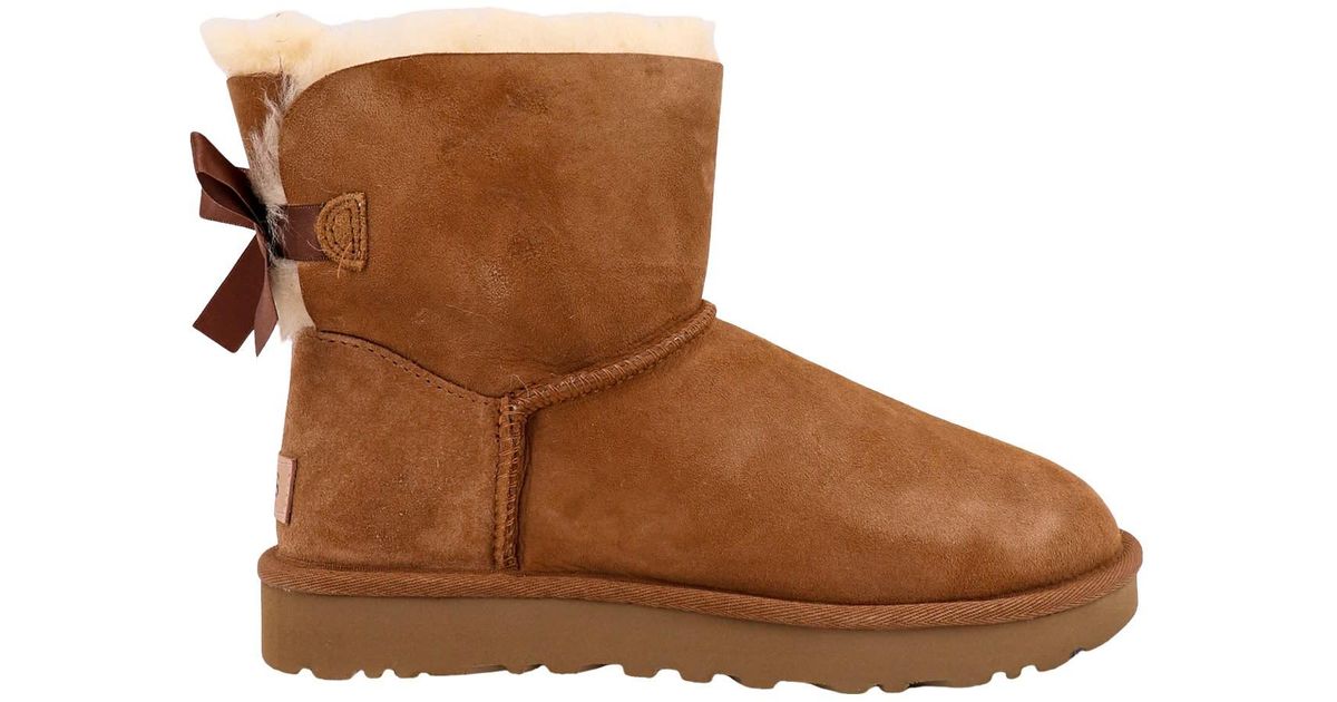 UGG Suede Faux Fur-Lined Bow Boots in Brown | Lyst