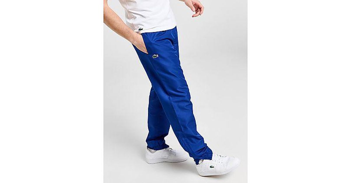 Lacoste guppy track pants black store