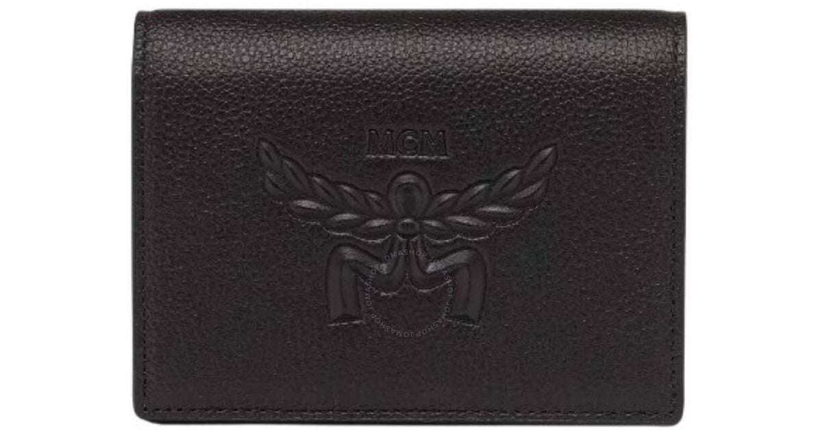 MCM Embossed Logo Leather Mini Himmel Snap Wallet in Black | Lyst UK