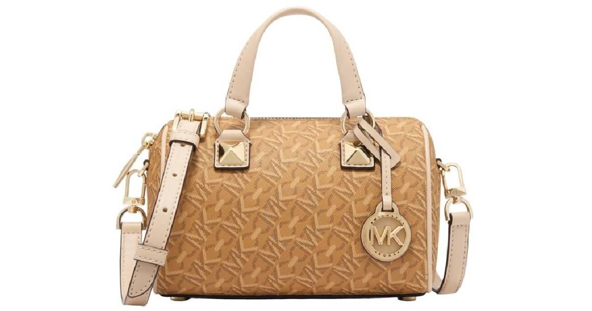 Michael Kors Grayson Signature Logo Duffle Bag in Natural | Lyst