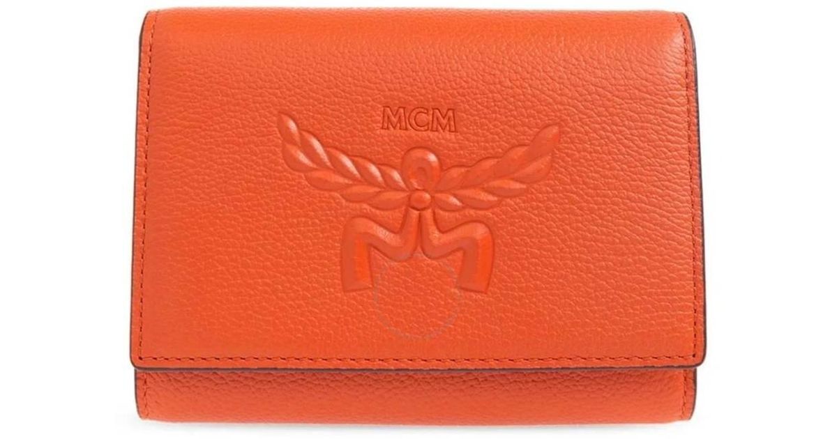 MCM Embossed Logo Small Himmel Trifold Wallet in Orange | Lyst