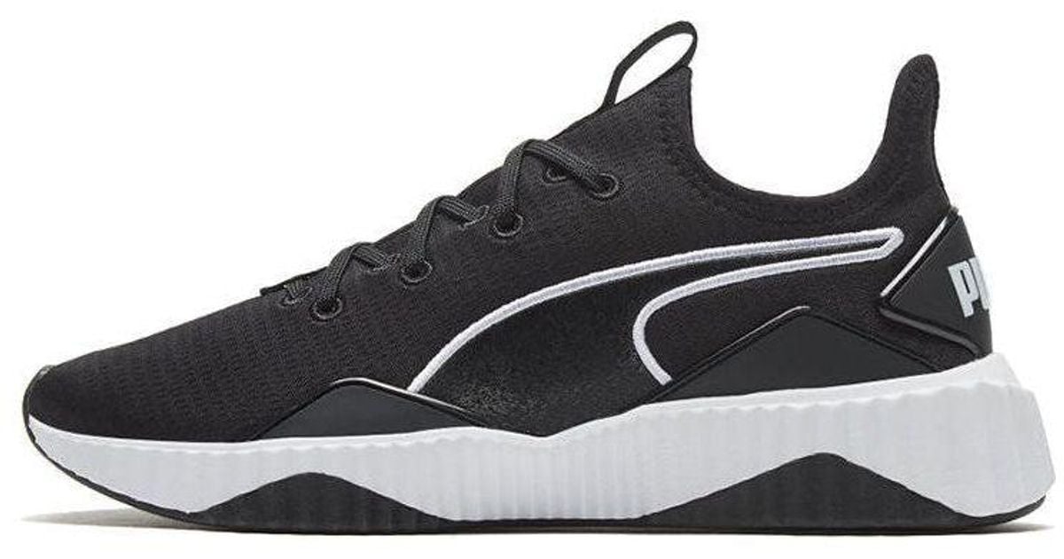 PUMA (Wmns) Defy New Core in Black | Lyst