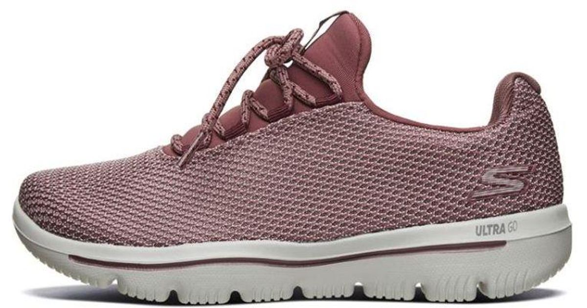Skechers (Wmns) Go Walk Evolution Ultra Sneakers in Brown | Lyst
