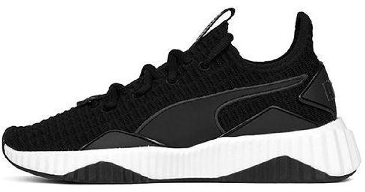 PUMA (Wmns) Defy in Black | Lyst