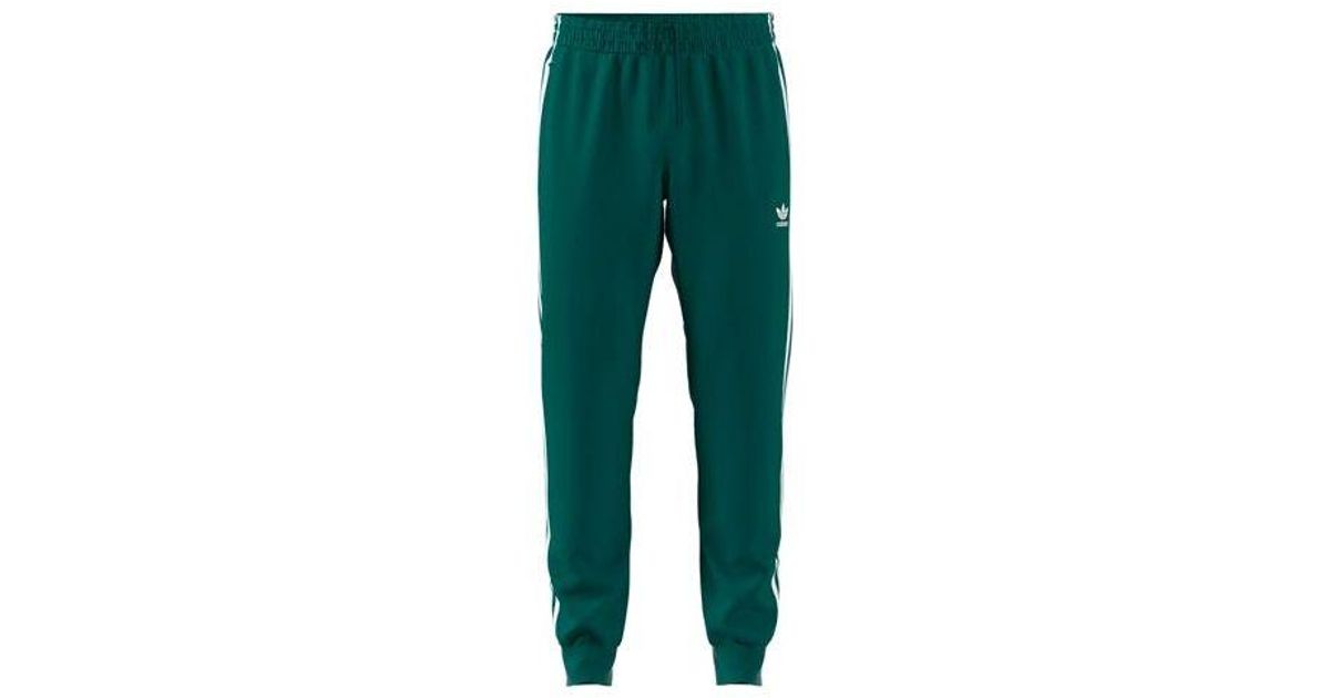 adidas Originals Sst Tp Logo Embroidered Sports Pants in Green for Men ...