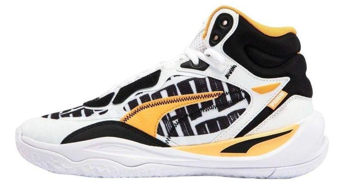 PUMA Playmaker Pro Mid in Blue for Men | Lyst