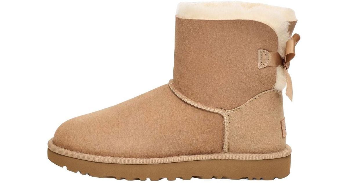 UGG (Wmns) Mini Bailey Bow Ii 'Sand' in Brown | Lyst