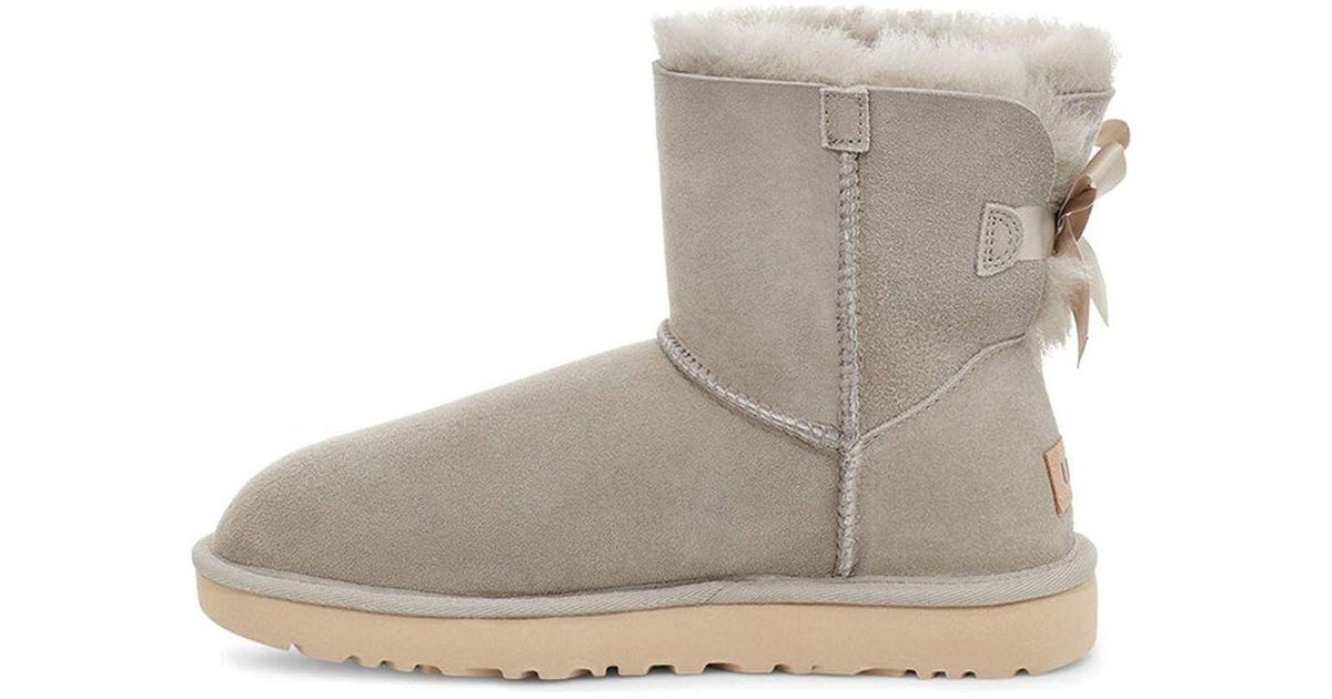 UGG (Wmns) Mini Bailey Bow Ii Fleece Lined Light in Gray | Lyst