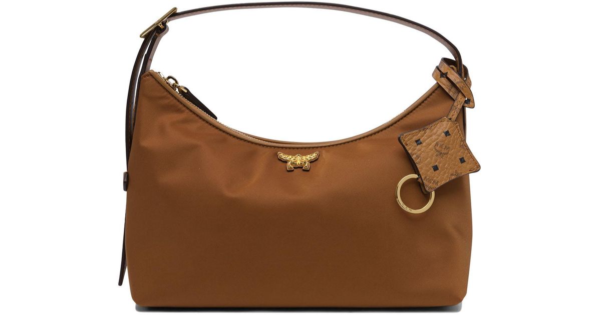 MCM Mini Shoulder Handbag in Brown | Lyst