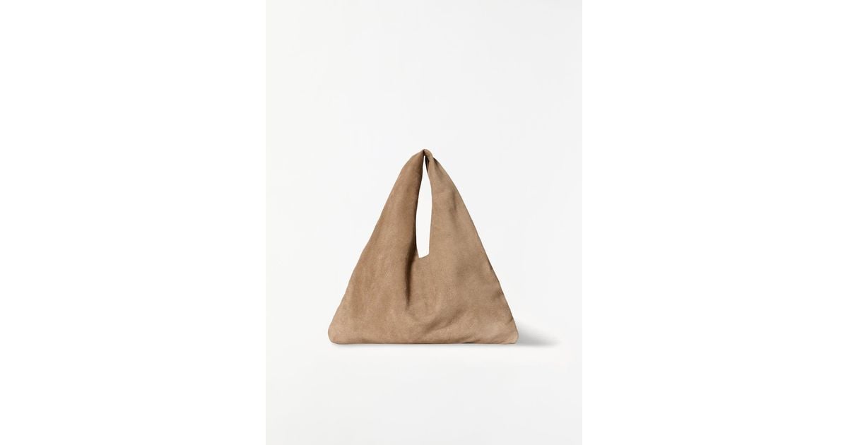 The Row Small Suede Bindle in Natural | Lyst