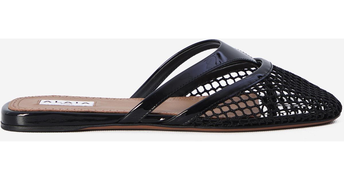 Alaïa Flat Thong Sandals in Black | Lyst