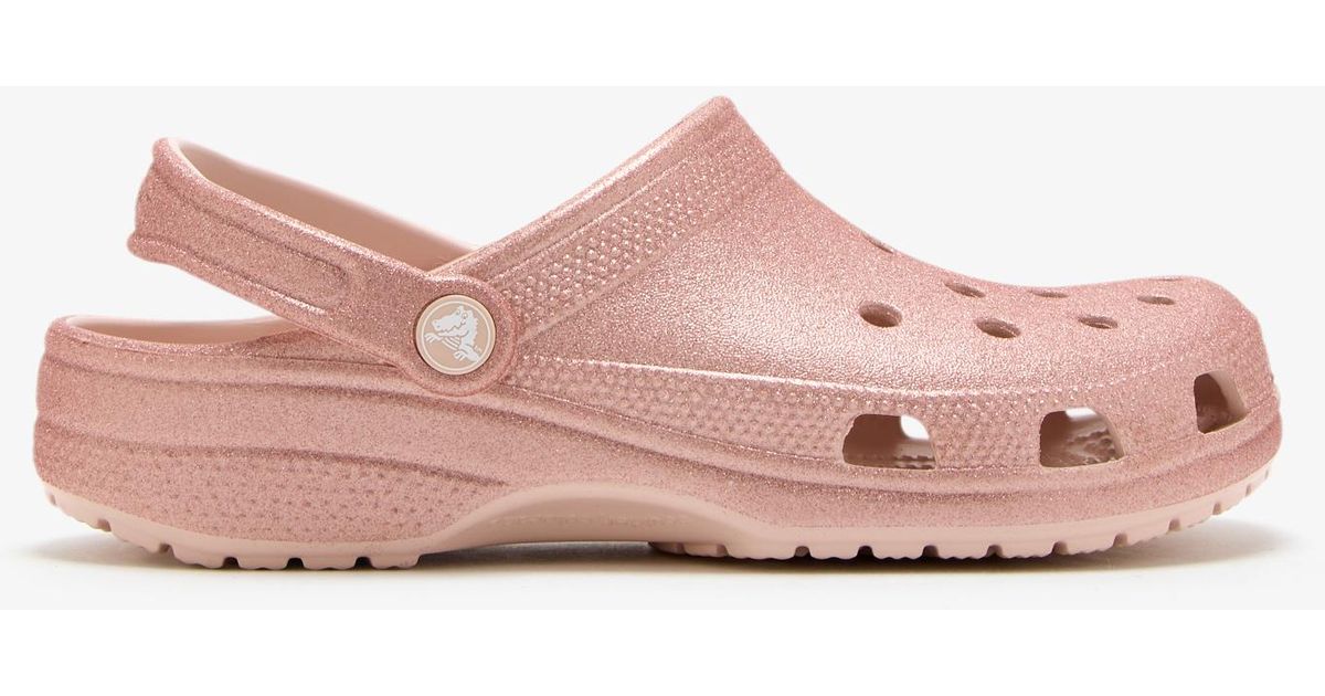 Crocs™ Classic Glitter Clogs in Pink | Lyst