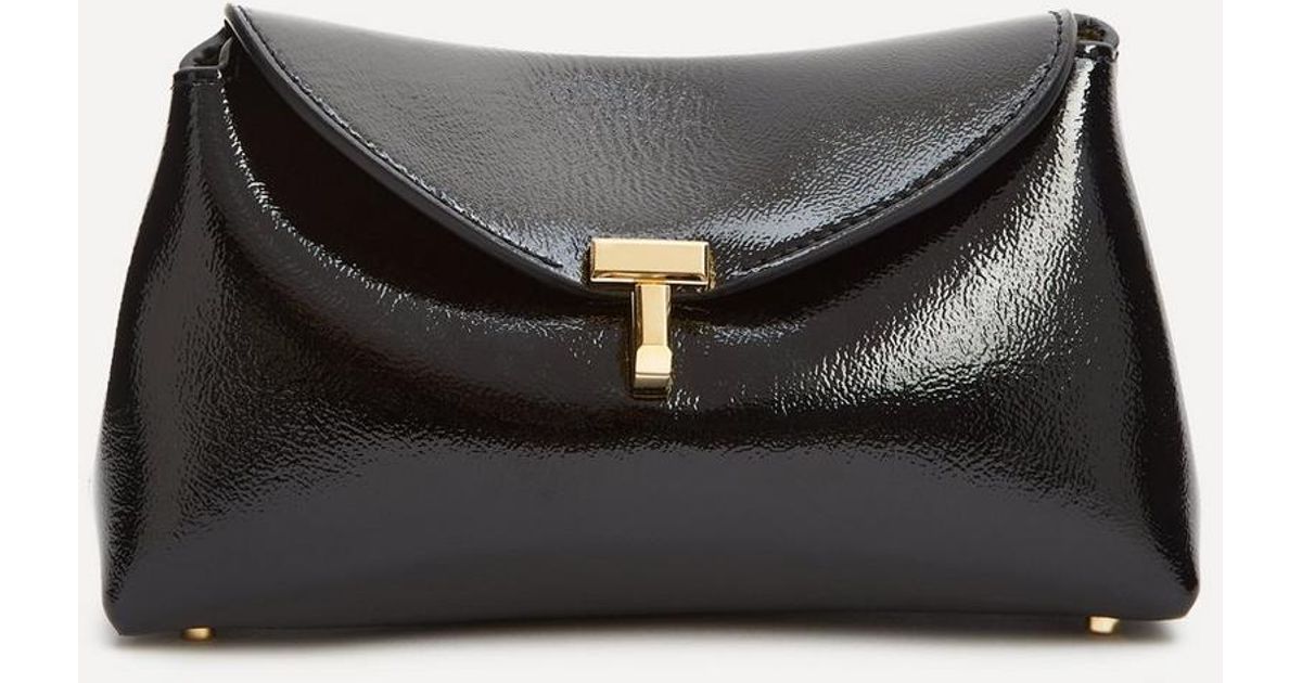 TOTEME Mini T-Lock Leather Clutch in Black | Lyst UK