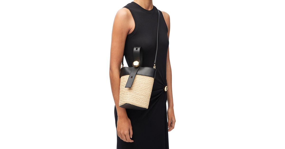 Loewe Luxury Mini Pebble Bucket Bag In Raffia And Calfskin in Black | Lyst