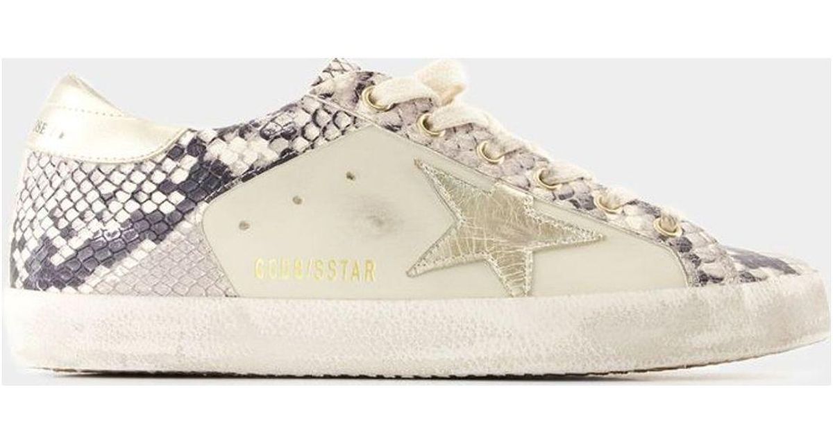 Golden Goose Super Star Leather And Python Print Sneaker in White | Lyst