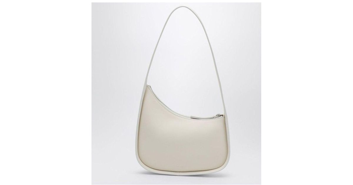 The Row Ivory Half Moon Bag in White | Lyst