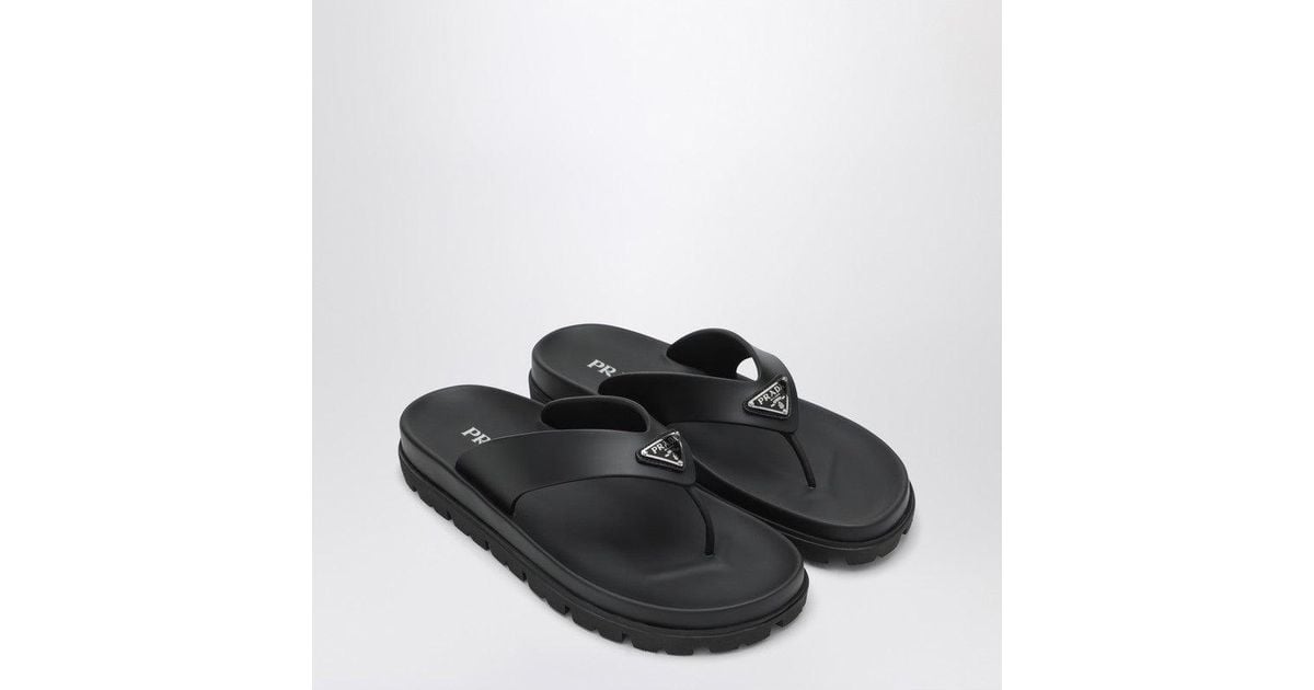Prada Rubber Flip-Flop Sandal With Enamel Logo in Black | Lyst