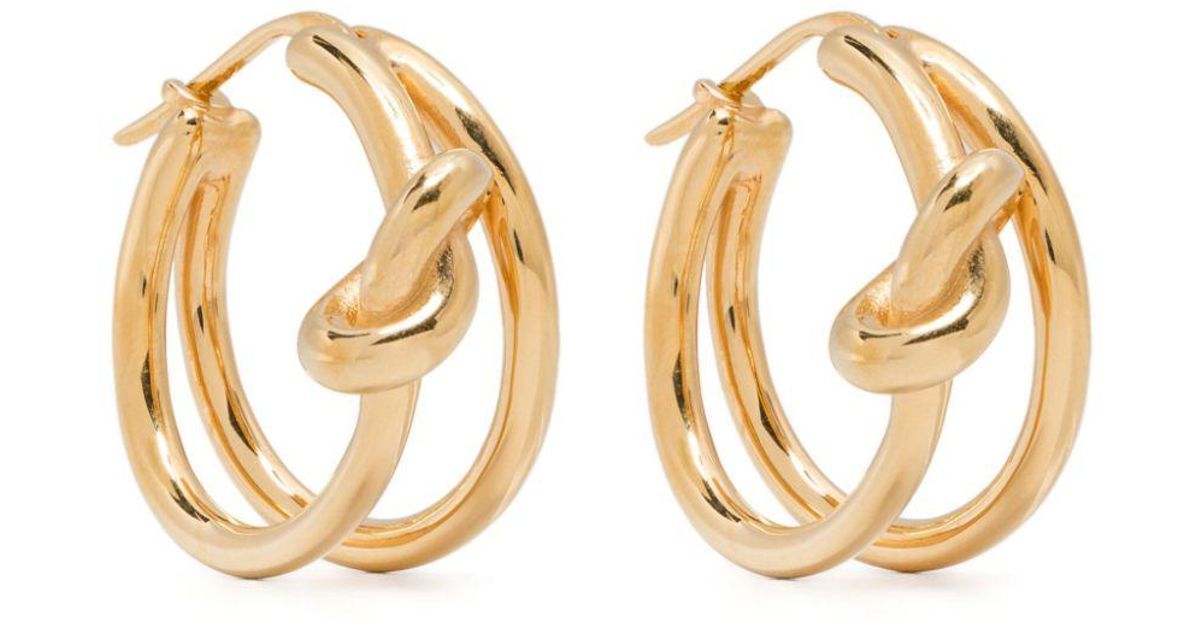 Celine Knot Double Hoops Orecchini in Metallic | Lyst