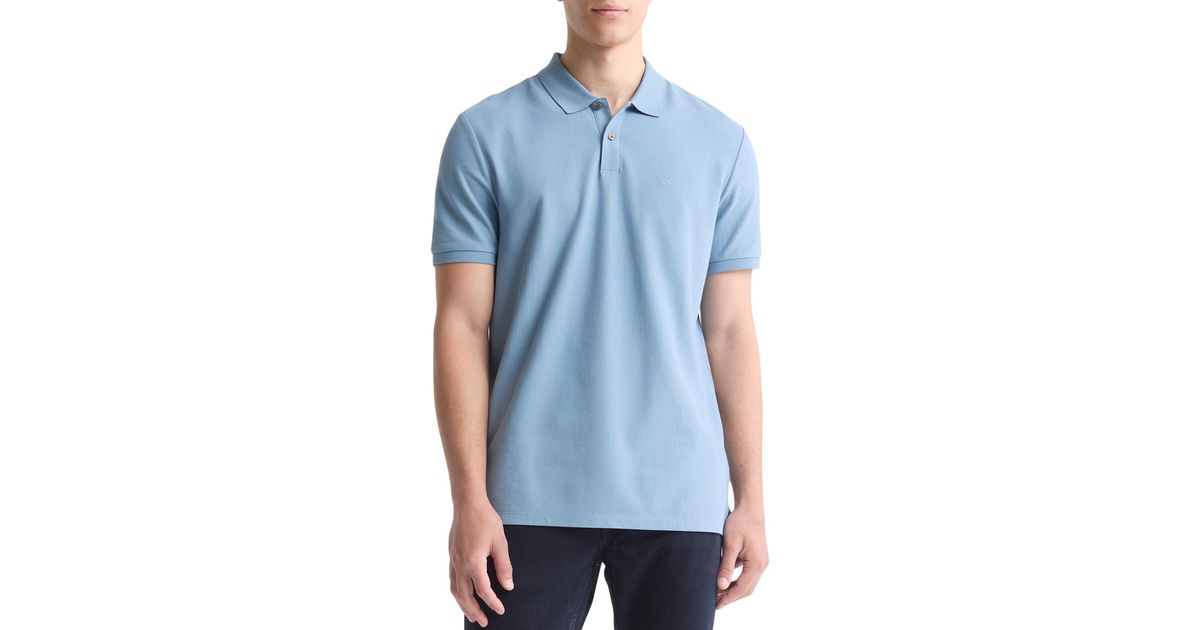 Calvin Klein Pique Solid Polo in Blue for Men | Lyst