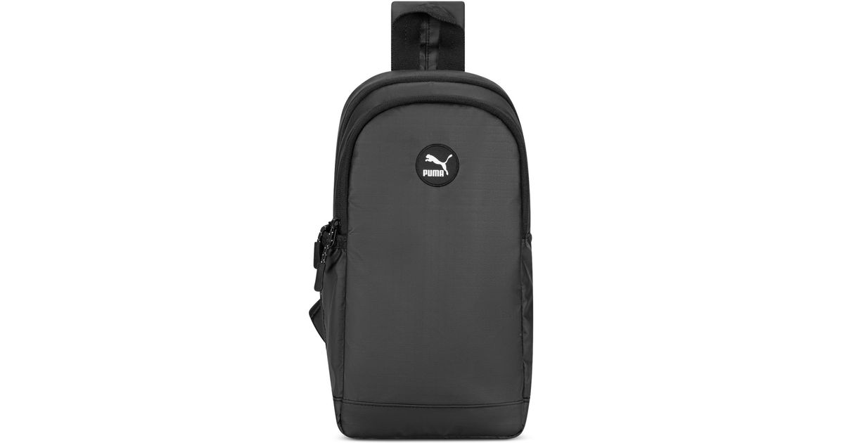 PUMA Logo Sling Backpack in Black | Lyst