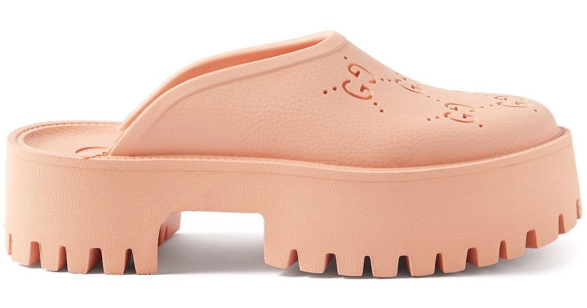 Sabots en caoutchouc à logos GG perforés Caoutchouc Gucci en coloris ...