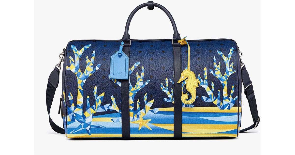 MCM Ottomar Weekender Bag In Cubic Coral Visetos in Blue for Men | Lyst