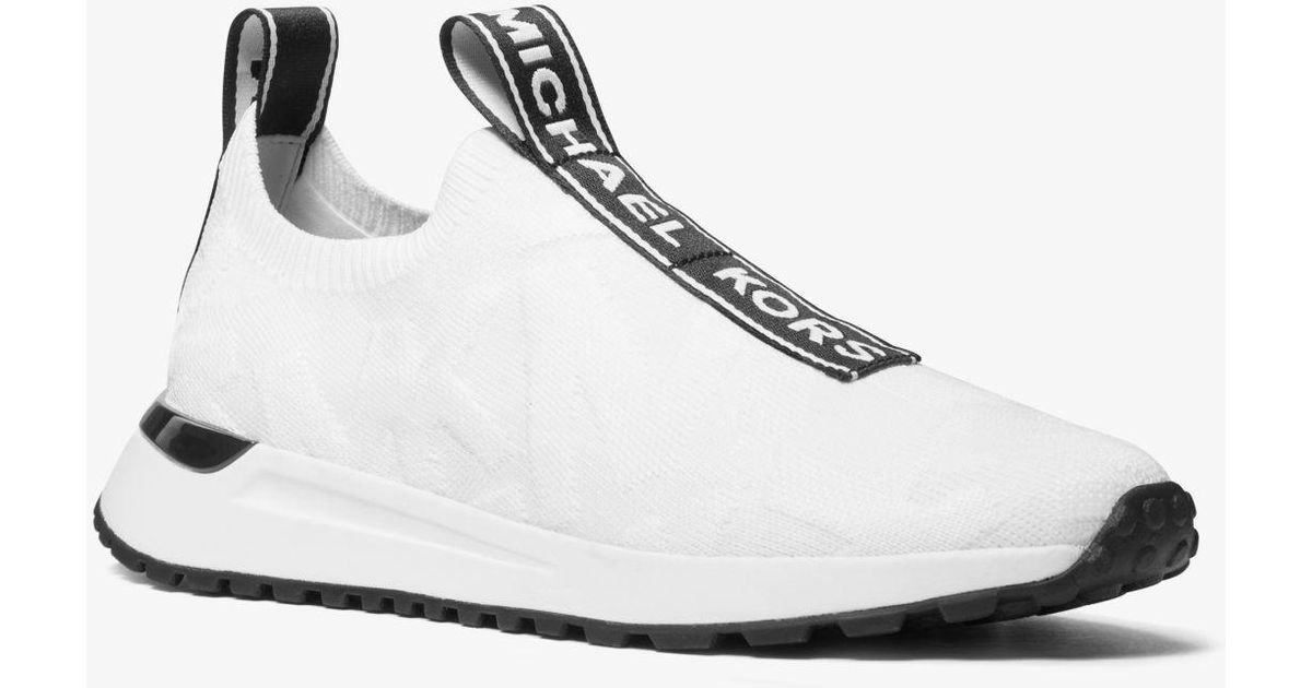 Michael Kors Bodie Logo Embossed Stretch Knit Slip-on Trainer in White ...