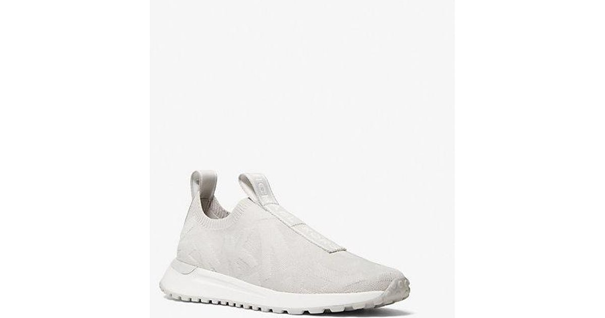 Michael Kors Mk Bodie Logo Embossed Stretch Knit Slip-On Trainer in ...