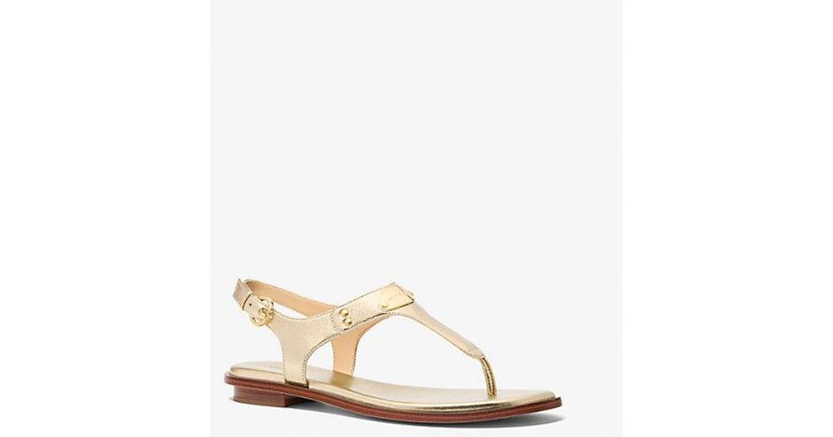 Michael Kors Metallic Logo Plate T-strap Sandal in Natural | Lyst
