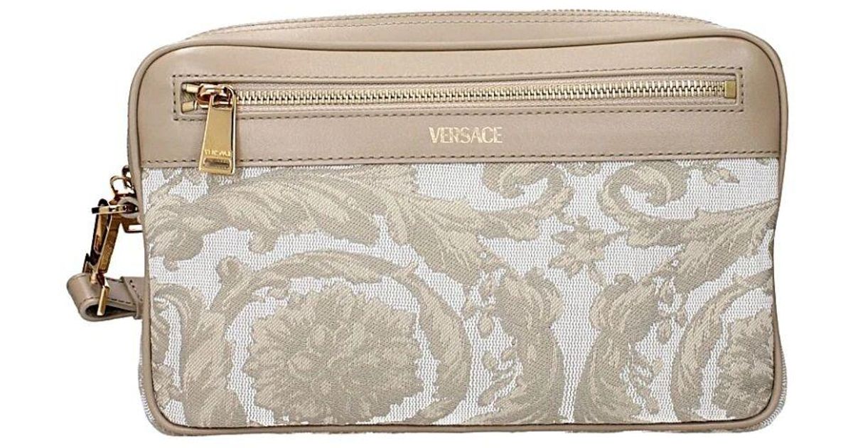 Versace Clutches in Metallic for Men | Lyst