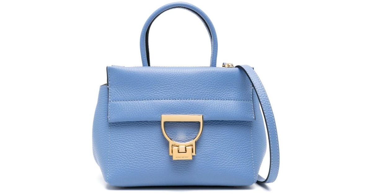 Coccinelle Handbags in Blue | Lyst