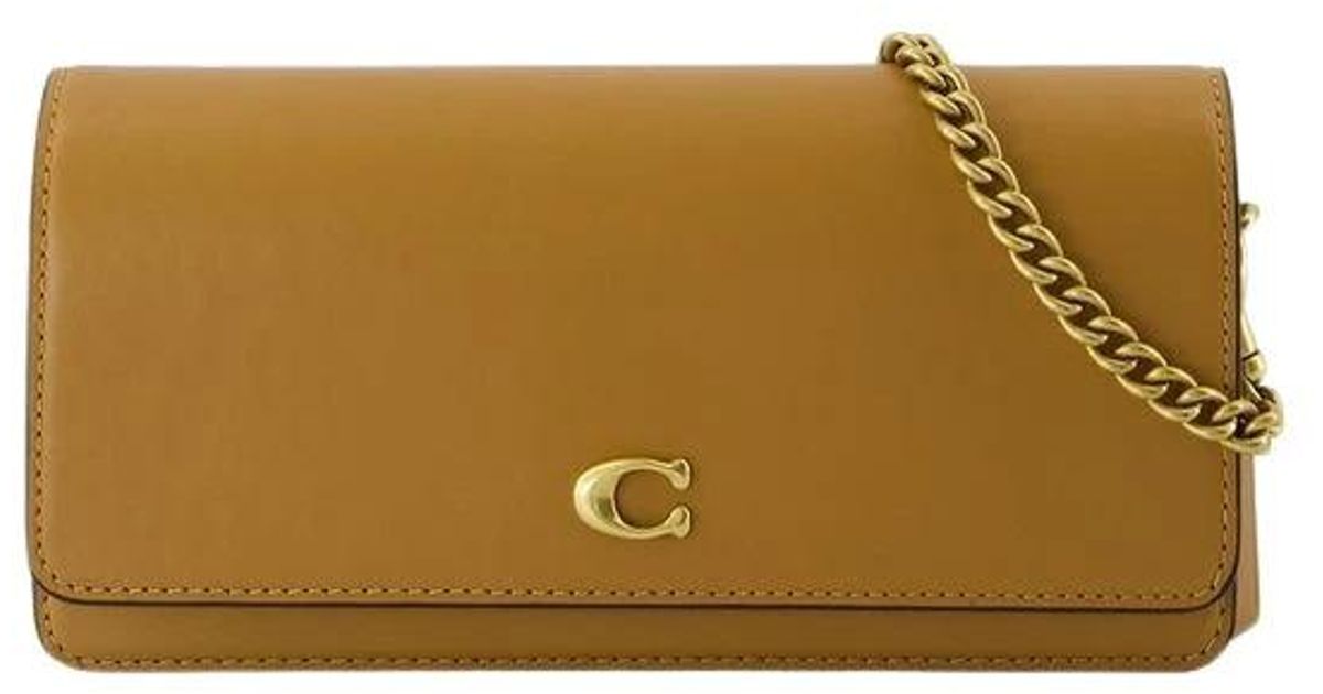 COACH Cross Body Bags in Natural | Lyst