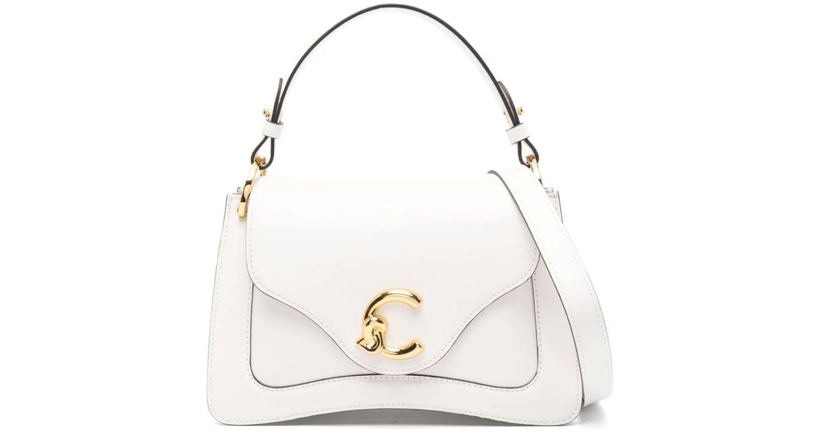 Coccinelle Handbags in White | Lyst