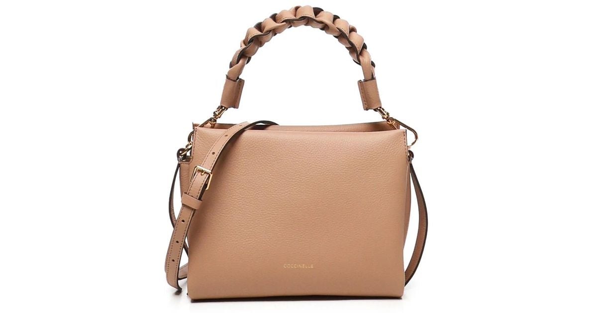 Coccinelle Handbags in Natural | Lyst