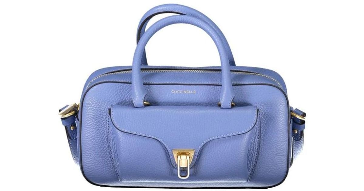 Coccinelle Handbags in Blue | Lyst