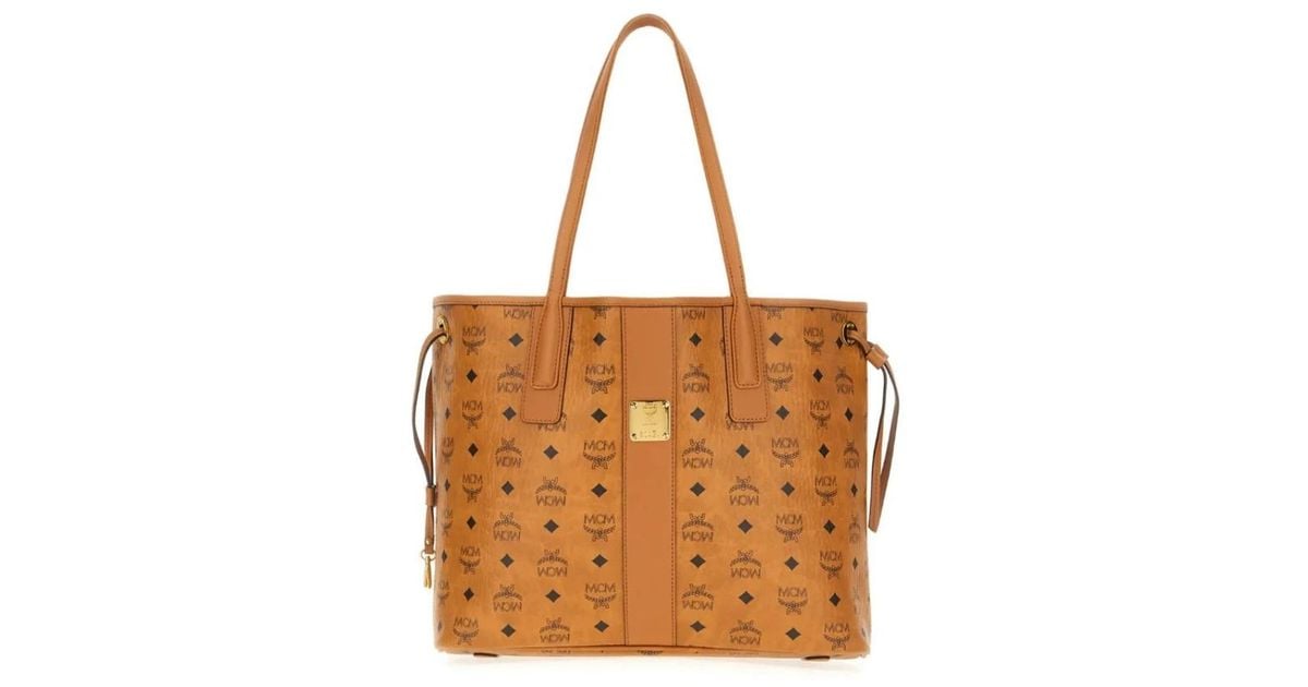 MCM Tote Bags in Brown | Lyst