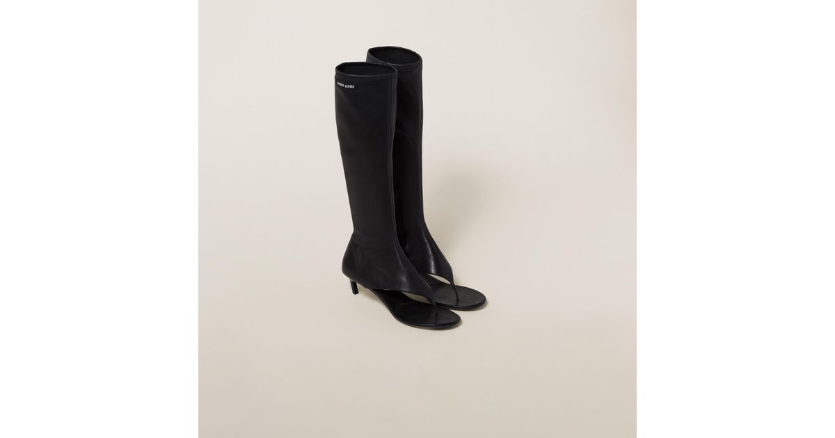 Miu Miu Stretch Nappa Leather Thong Boots in Black | Lyst