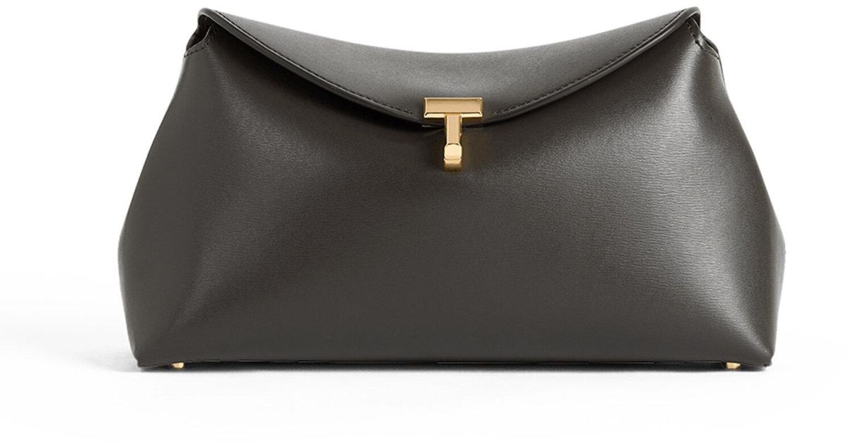 Totême T-lock Leather Clutch in Black | Lyst