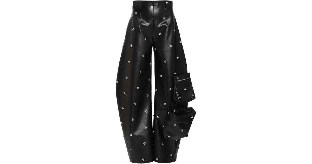 A.W.A.K.E. MODE Faux Leather Studded Flared Leg Pants in Black | Lyst