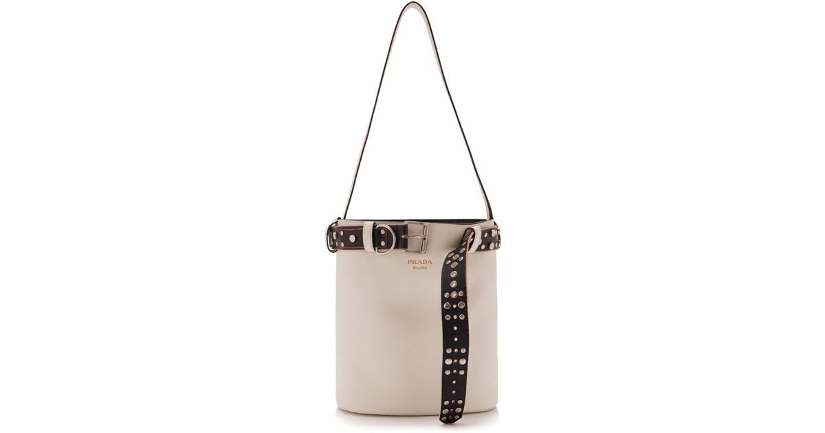 Prada Buckle Leather Bucket Bag in White | Lyst