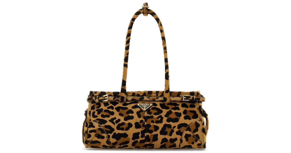 Prada Handbags in Metallic | Lyst