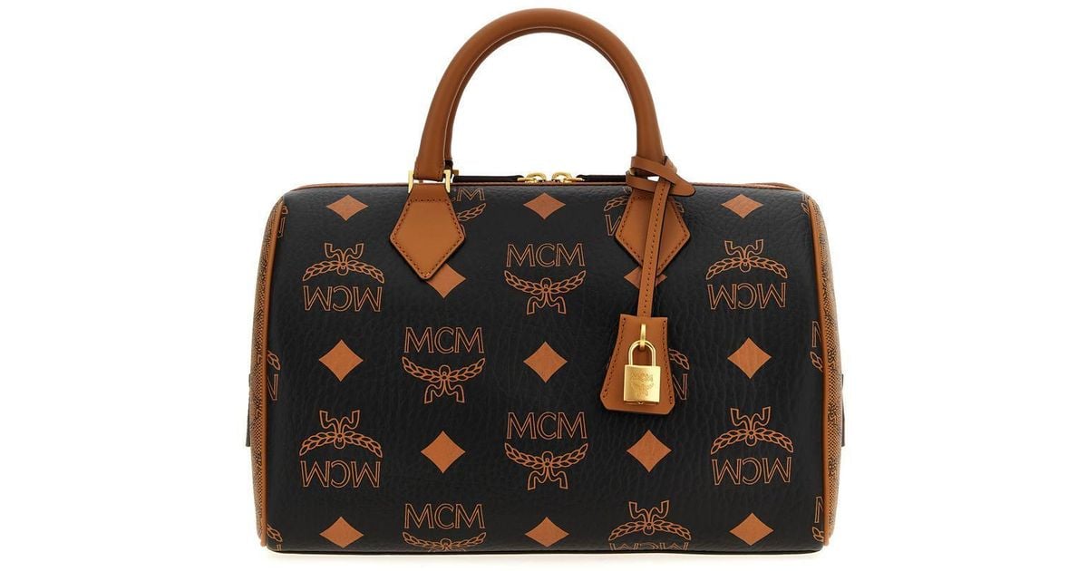 MCM Handbags in Black | Lyst